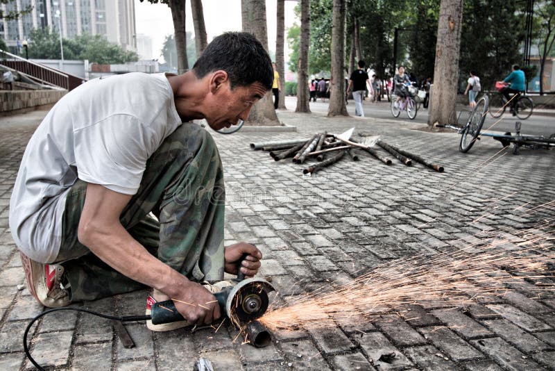 Operating a Chinese Corn Popper Editorial Photography - Image of ...