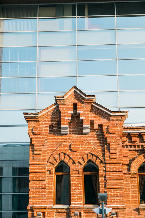 Architecture Contrast Old House and a New Modern Building Stock Image ...
