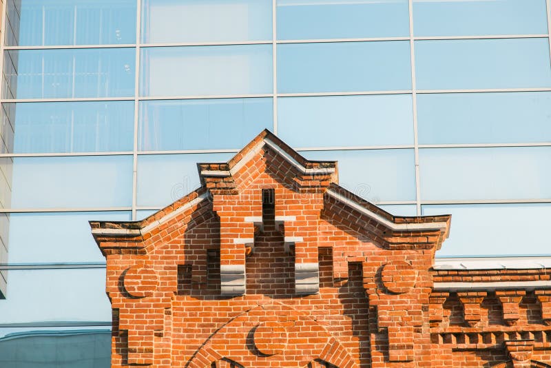 Architecture Contrast Old House and a New Modern Building Stock Photo ...