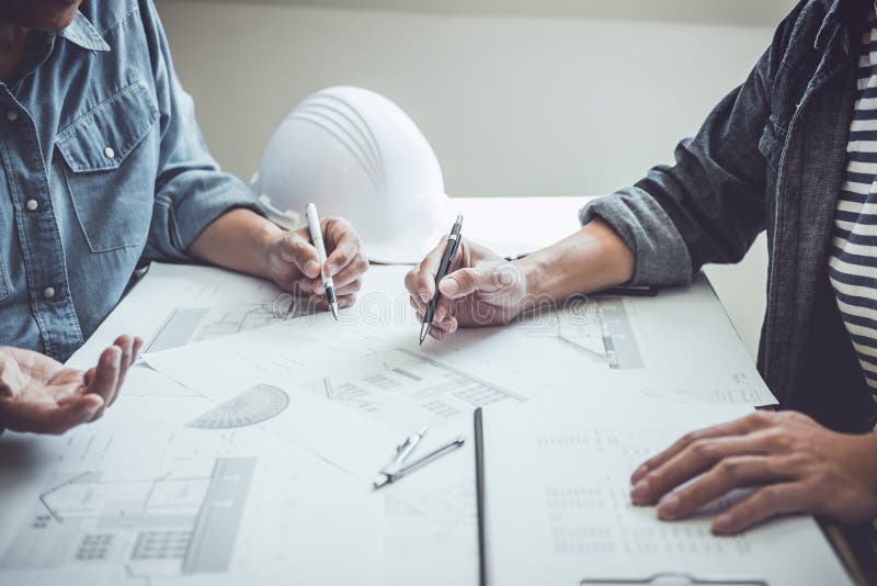 Architecture Engineer Teamwork Meeting, Drawing and Working for ...