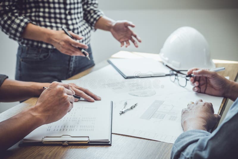 Architecture Engineer Teamwork Meeting, Drawing and Working for ...