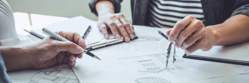 Architecture Engineer Teamwork Meeting, Drawing and Working for Stock ...