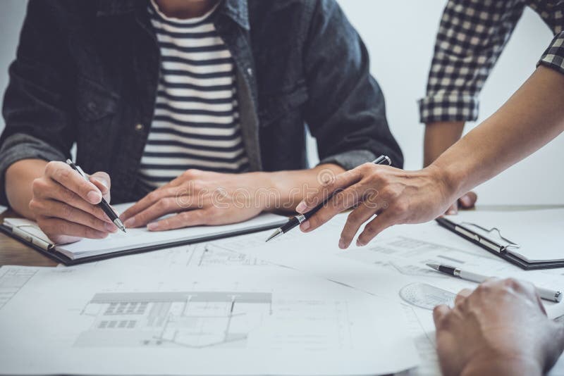 Architecture Engineer Teamwork Meeting, Drawing and Working for ...