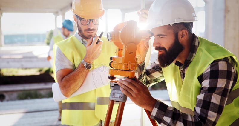 Young Asian Engineer Couple Work Together Using Notebook Computer at ...
