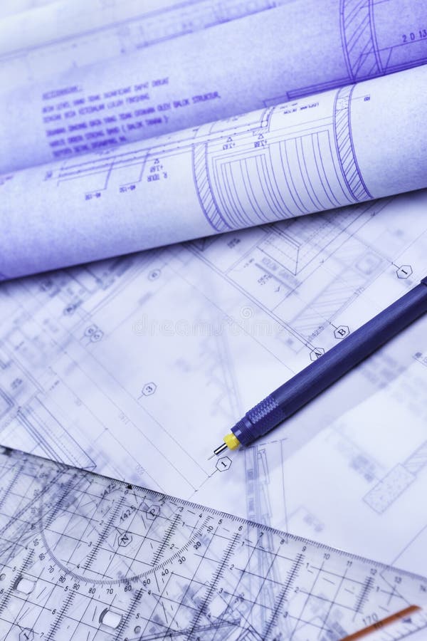 Rolled Architecture Blueprints on a Table Stock Photo - Image of ...