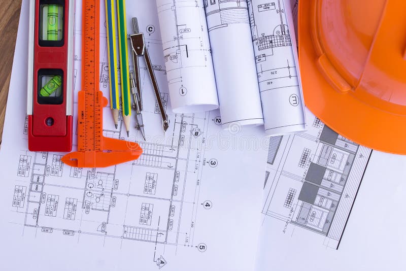 Architecture Plan and Rolls of Blueprints with Tool Kit Stock Photo ...