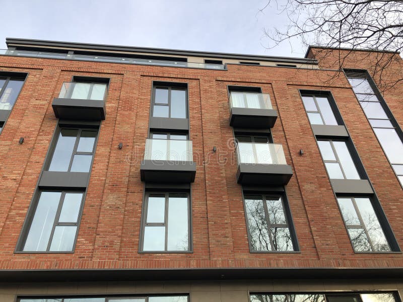 Architecture and Real Estate, Residential Apartment Building with Large ...