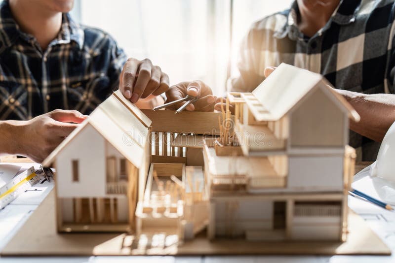 Architecture Team Drawing Something while Working with Blueprint in the ...