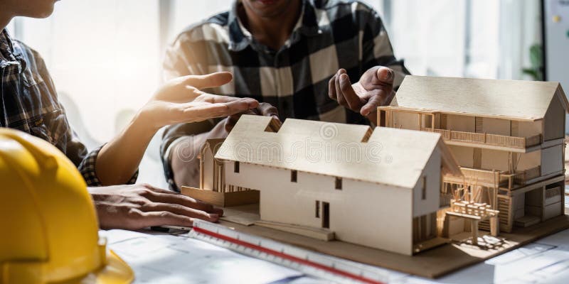 Architecture Team Drawing Something while Working with Blueprint in the ...