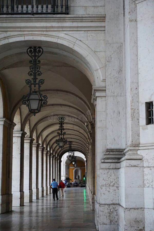 Arches in Central Lisbon with People Walking in the Distance Editorial ...