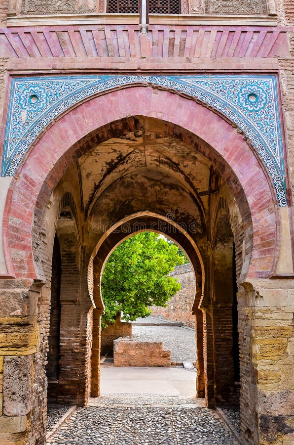 The Archway is Made of Brick and Has a Tree Growing Out of it Stock ...