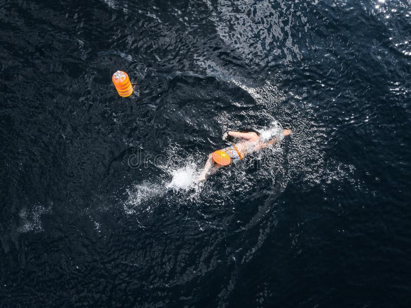 Arctic People Swim in Ice Hole in Cold Water, Walrus Athletes Stock ...