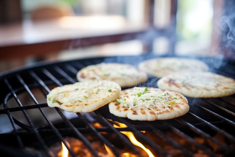 Arepas Cooking on a Flame with Grill Marks Stock Image - Image of ...