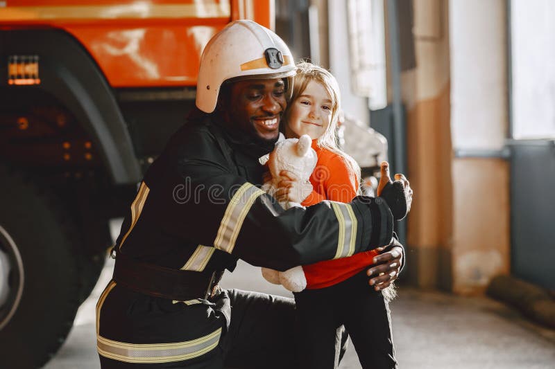 Portrait of a Firefighter Standing in Front of a Fire Engine Stock ...