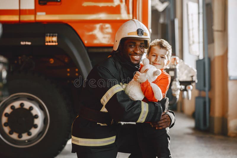 Portrait of a Firefighter Standing in Front of a Fire Engine Stock ...