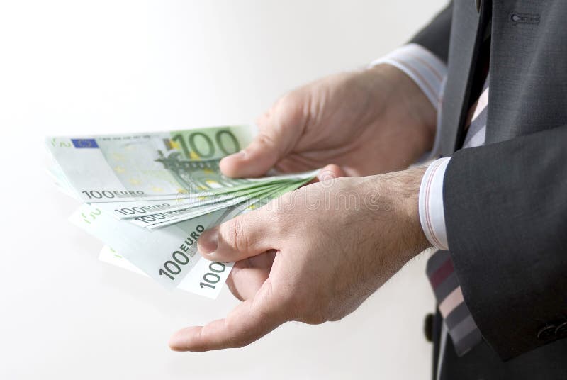 Argent Dans Les Mains Des Hommes Sur Un Fond Blanc Image stock - Image ...