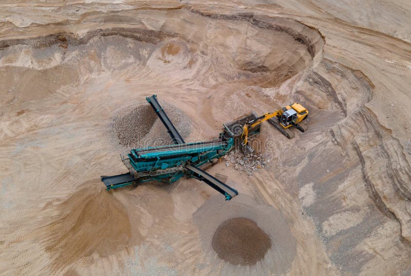 Arial View of the Open Pit Mine. Front End Loader Loading Gravel into ...