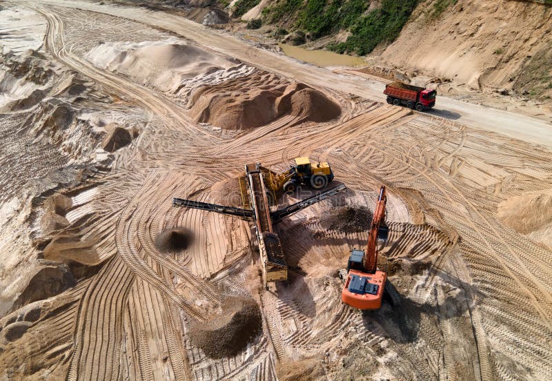 Arial View Of The Sand Open-pit Mining With Heavy Mining Machinery ...