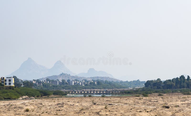 Arid Riverbed with Mountains in the Background Under Daylight Stock ...