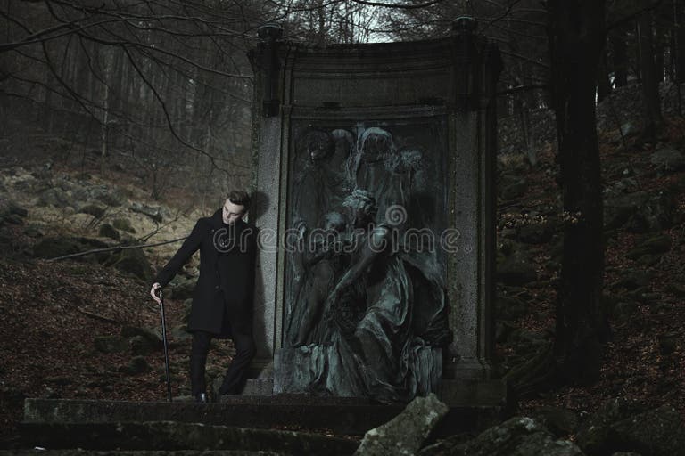 Aristocratic Vampire and Graveyard Statue Stock Image - Image of ...