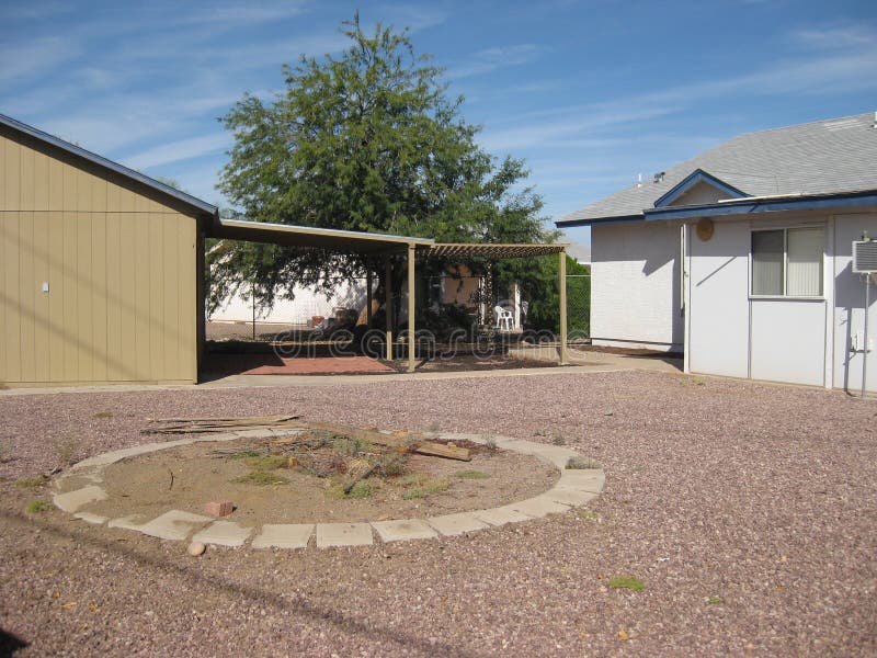 Arizona Back Yard with Fire Pit and Covered Patio Stock Image - Image ...