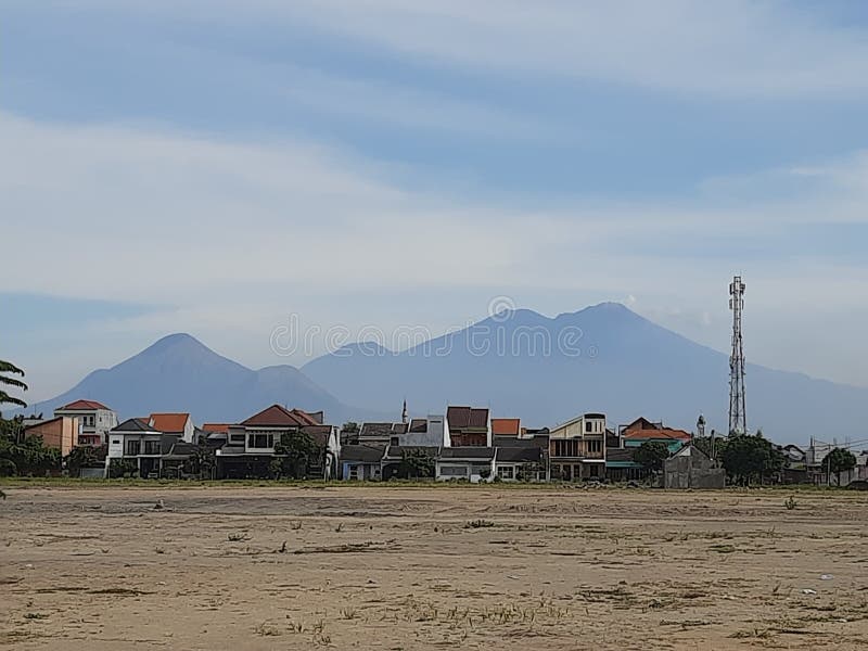 Arjuno and Penanggungan Mountain View from Downtown of Surabaya Stock ...