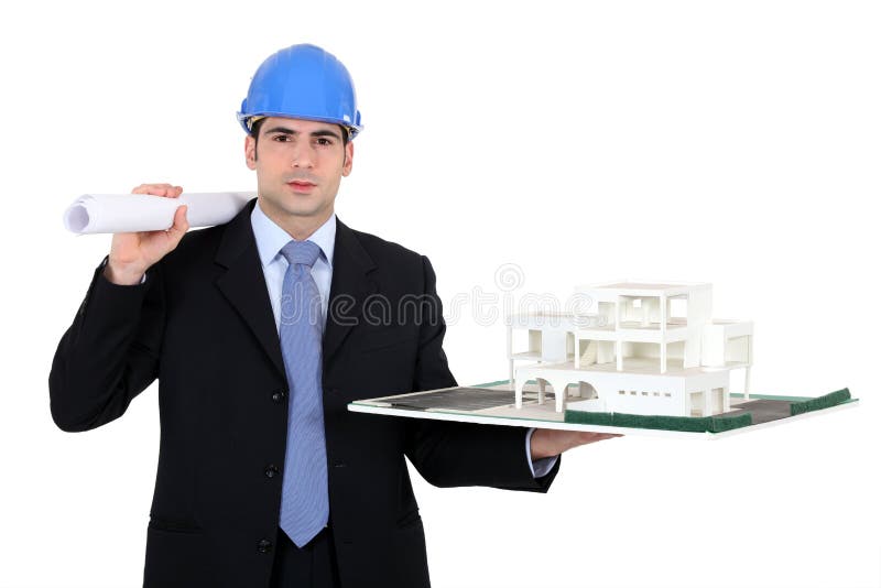 Arkitekt med en modell 3d fotografering för bildbyråer. Bild av ...