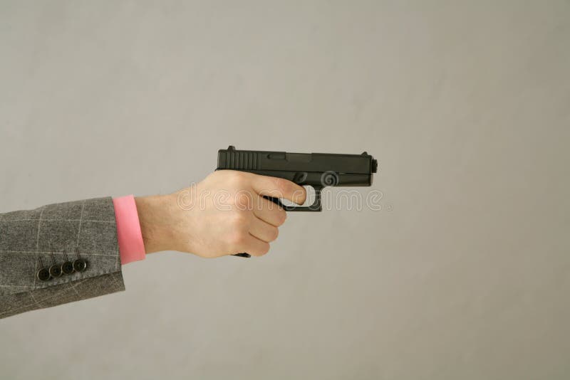 Arm holding gun stock image. Image of hand, danger, male - 4419705