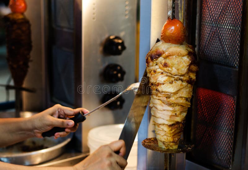 An Arm Moving To Cut the Kebab Meat Stock Photo - Image of preparation ...