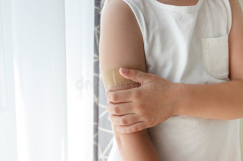 Arm with a Plaster on the Skin. Concept of Vaccination and Immunization ...