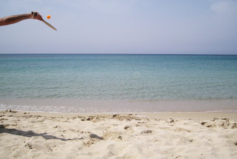 Arm, Racket, Ball while Playing at the Beach with Blue Sea Stock Photo ...