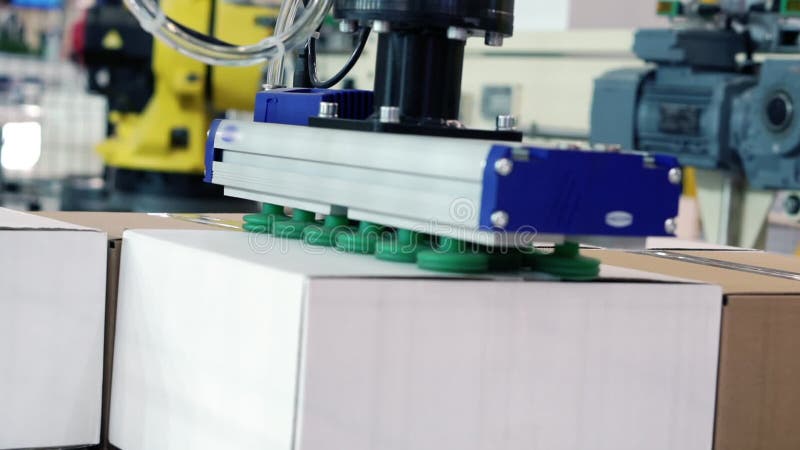 Mechanical Manipulator Stacks Cardboard Boxes. Stock Video - Video of ...