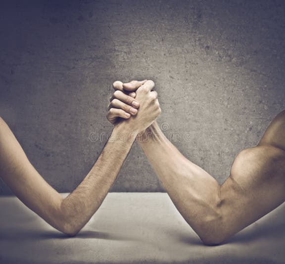 Strong Weak Men Arm Wrestling Stock Photos - Free & Royalty-Free Stock ...