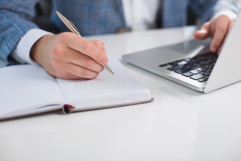Arm of Young Man Writing at Notebook Stock Photo - Image of ballpoint ...