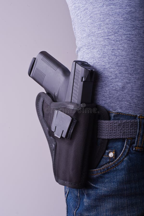 Arma de Holstered imagen de archivo. Imagen de pistola - 23984115
