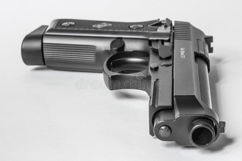 Arma De Mano Negra En El Fondo Blanco Foto de archivo - Imagen de arma ...