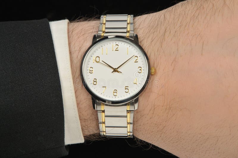 Armbanduhr an Hand stockfoto. Bild von instrument, fotographie - 13176674