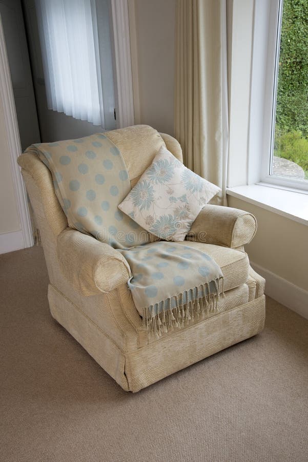 Armchair with Cushion and Shawl Stock Photo - Image of cushion ...