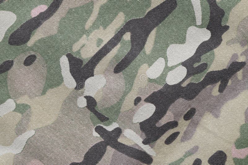 Armed force multicam camouflage fabric texture background close up ...