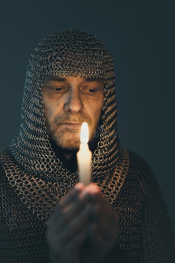 Armed Man in Chain Armor with Wax Candle Posing for Portrait in Studio ...