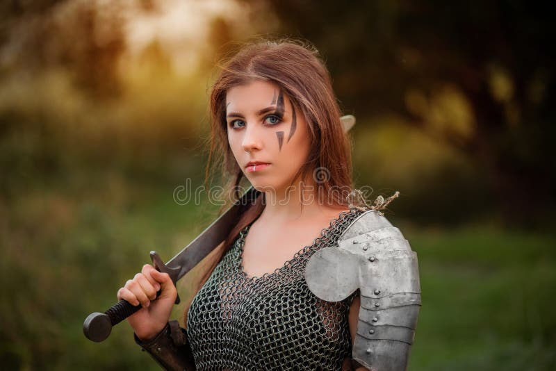 Armed Medieval Woman Warrior in Armor Posing while Standing on the ...