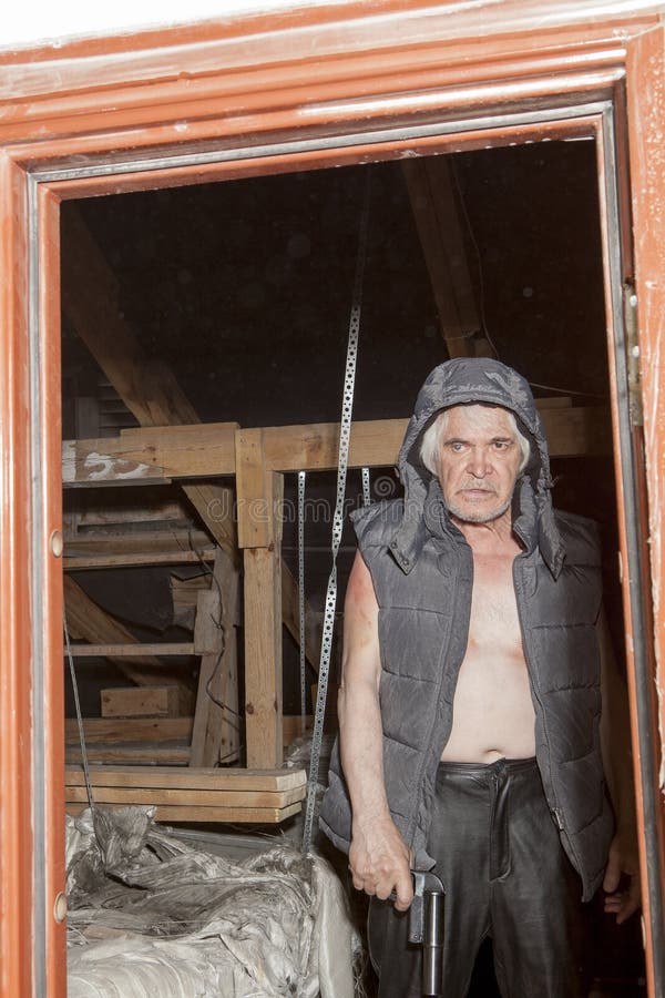 Armed Robber with a Gun in the Attic Stock Photo - Image of automatic ...