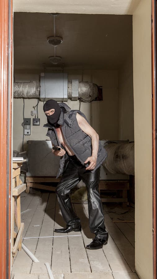 Armed Robber with a Gun in the Attic Stock Image - Image of danger ...