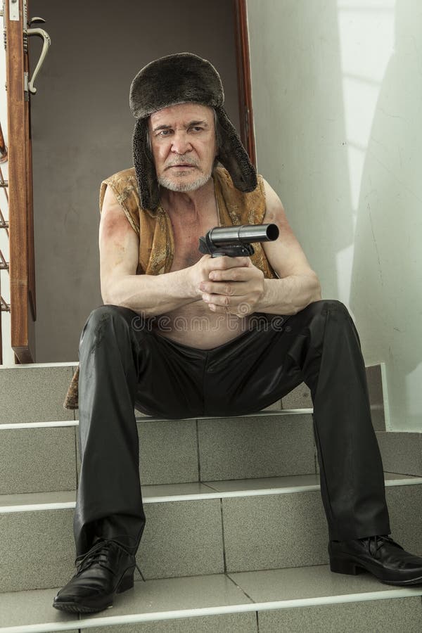 Armed Robber with a Gun in the Attic Stock Image - Image of thief ...