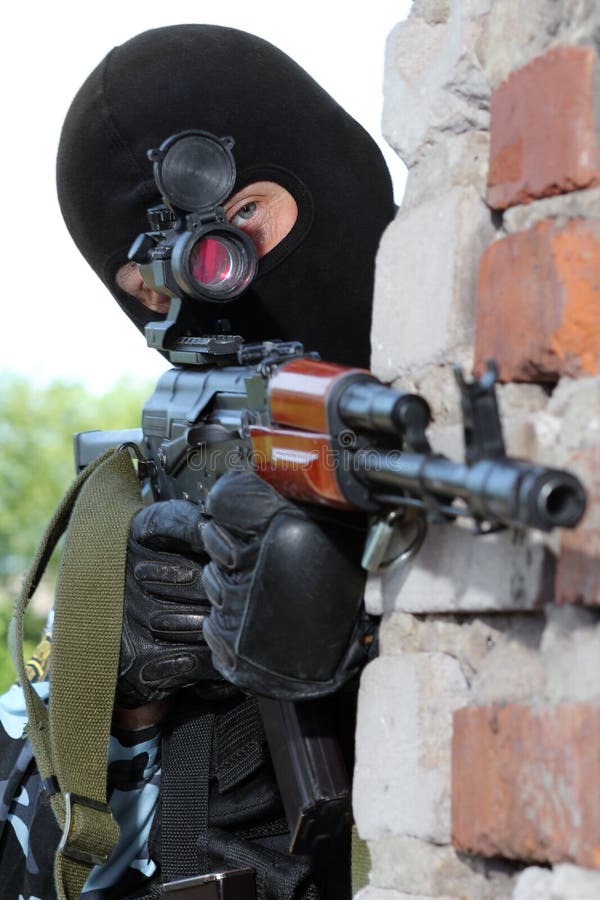 Armed Soldier in Black Mask Targeting with a Gun Stock Image - Image of ...