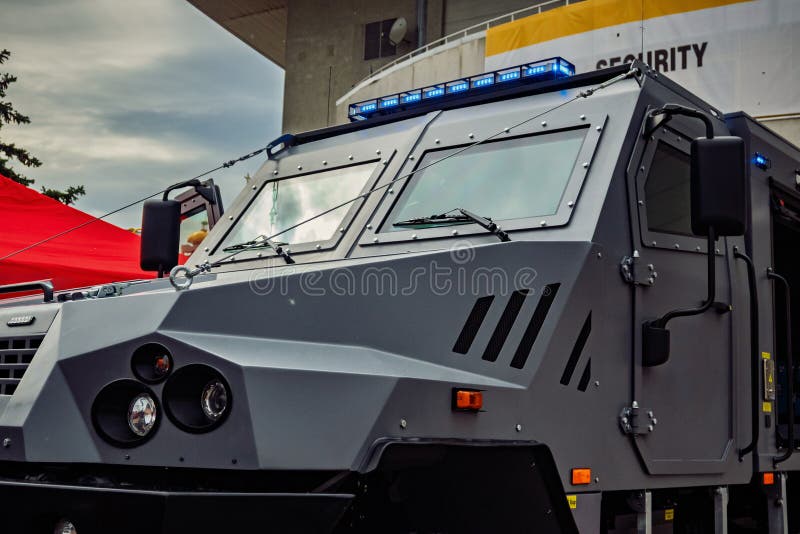 Armored Demining Vehicle with Open Compartment, Featuring Robust Tires ...