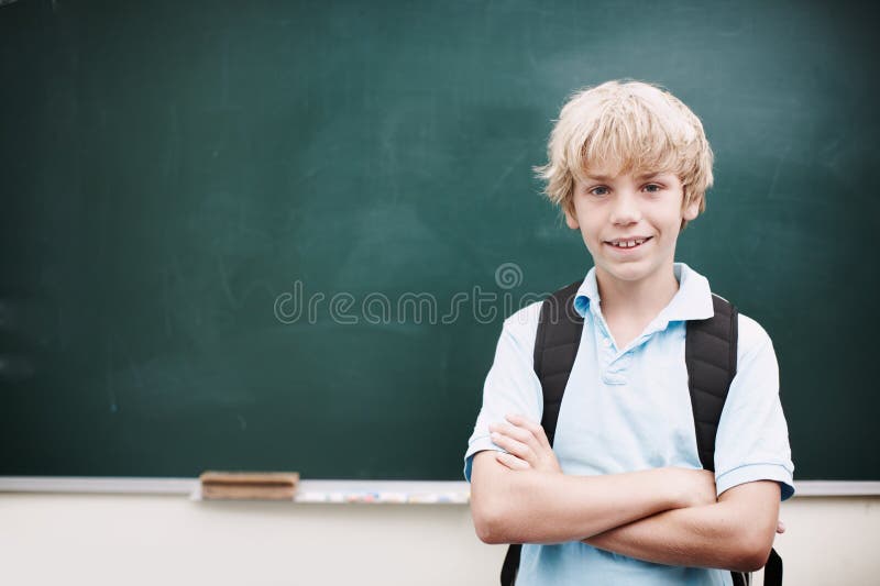 Arms Crossed, Chalkboard and Portrait of Boy in Classroom at School for ...