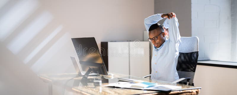 Arms Stretch Exercise Sitting at Desk Stock Image - Image of male ...