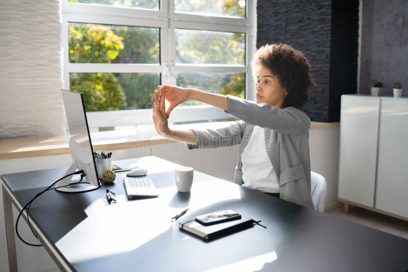 Arms Stretch Exercise Sitting at Desk Stock Image - Image of girl ...