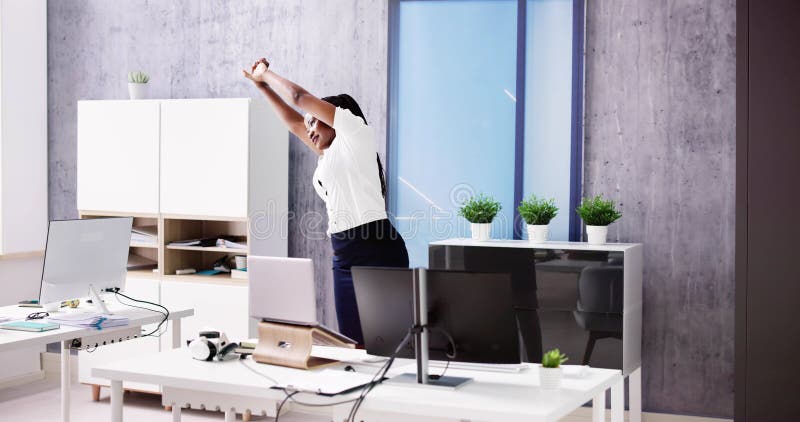 Arms Stretch Exercise Standing Near Desk Stock Photo - Image of ...